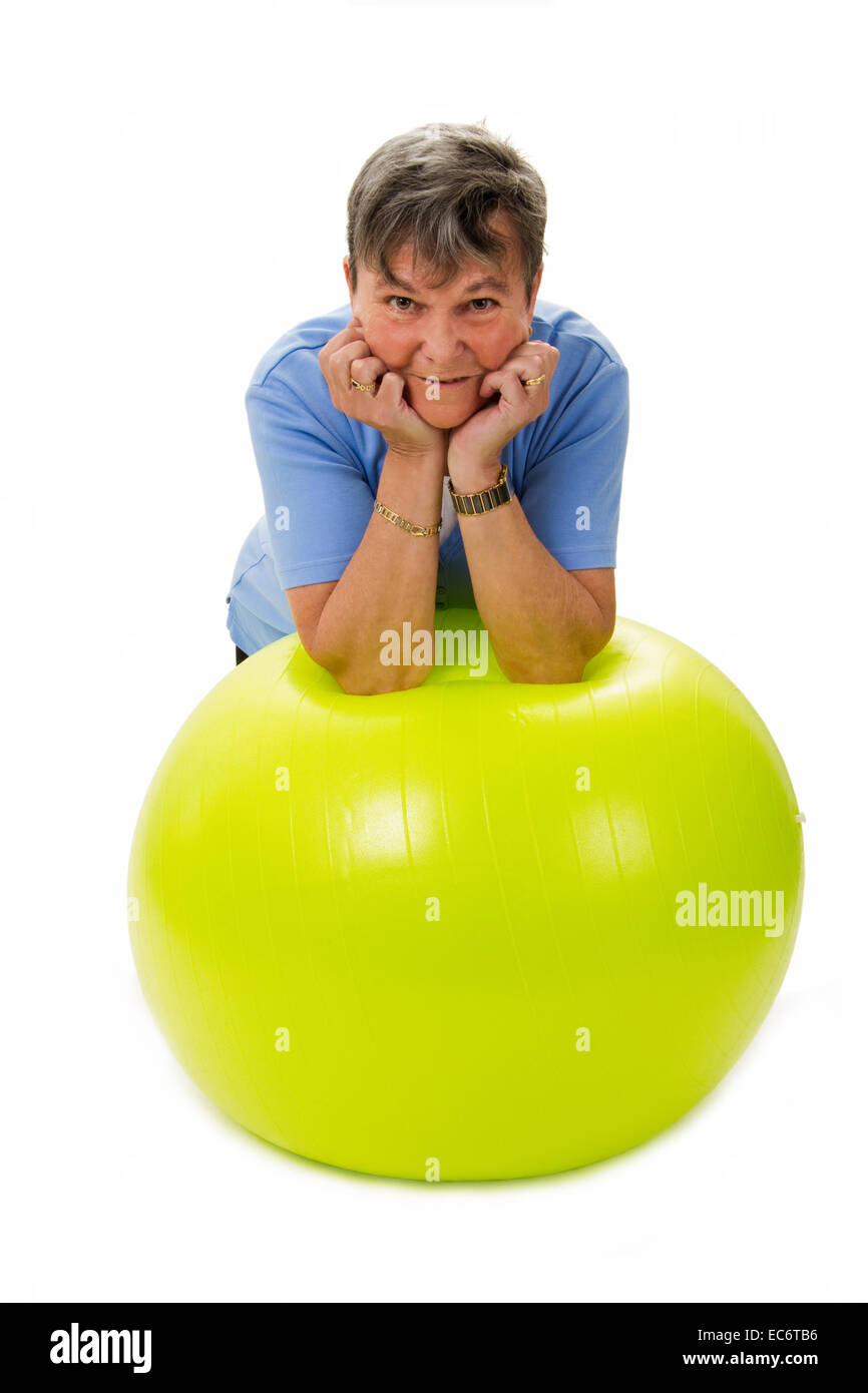 Senior woman with fitness ball Stock Photo - Alamy