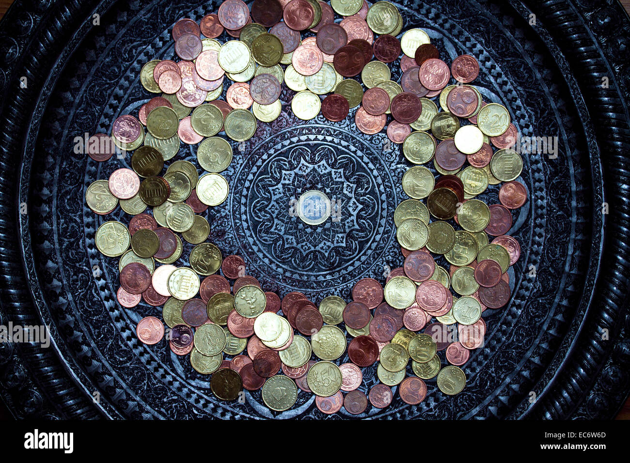 Circulation of money, euro coins Stock Photo - Alamy
