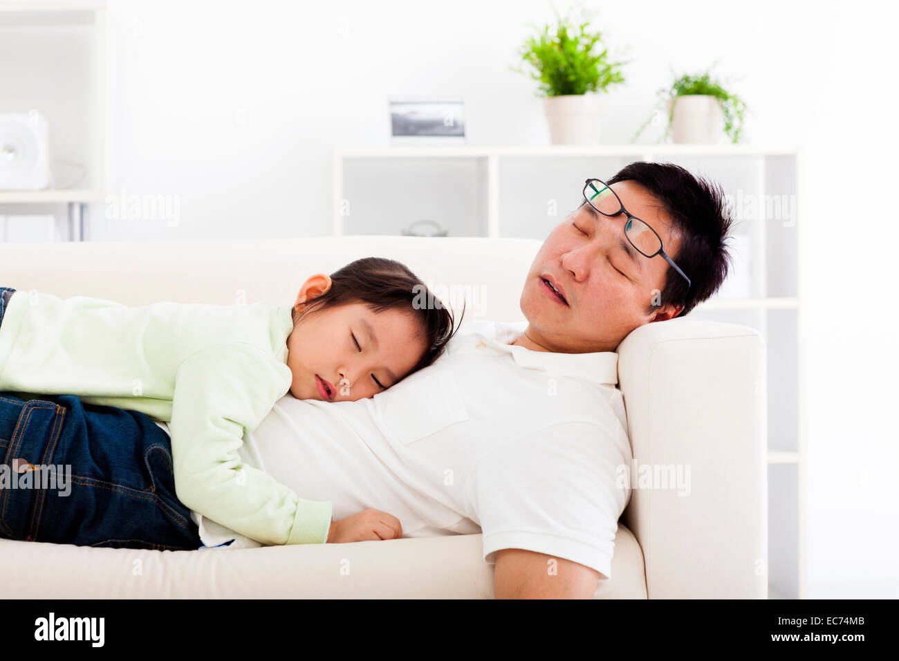 Father daughter sleeping on sofa hi-res stock photography and images ...