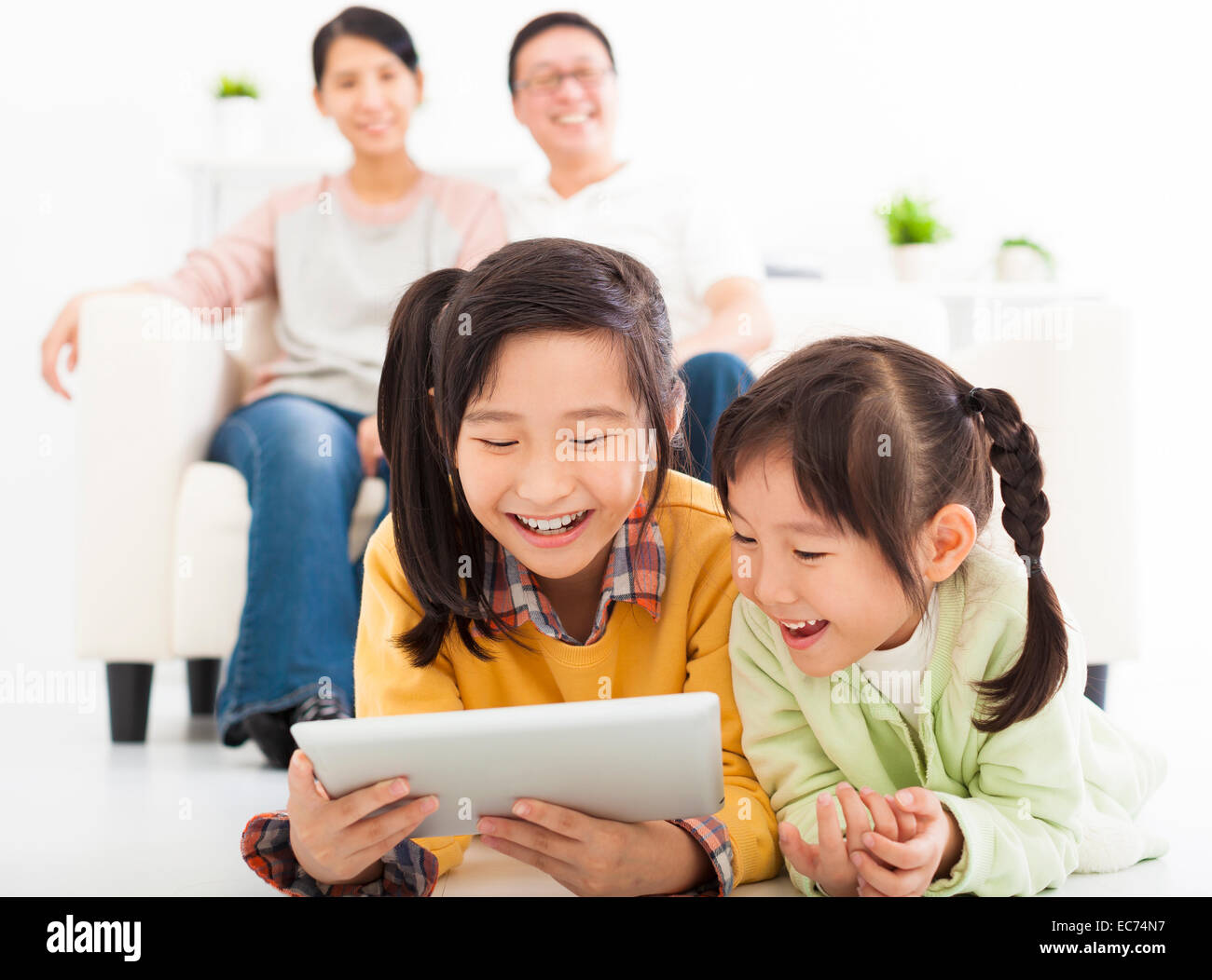 Happy using tech hi-res stock photography and images - Alamy