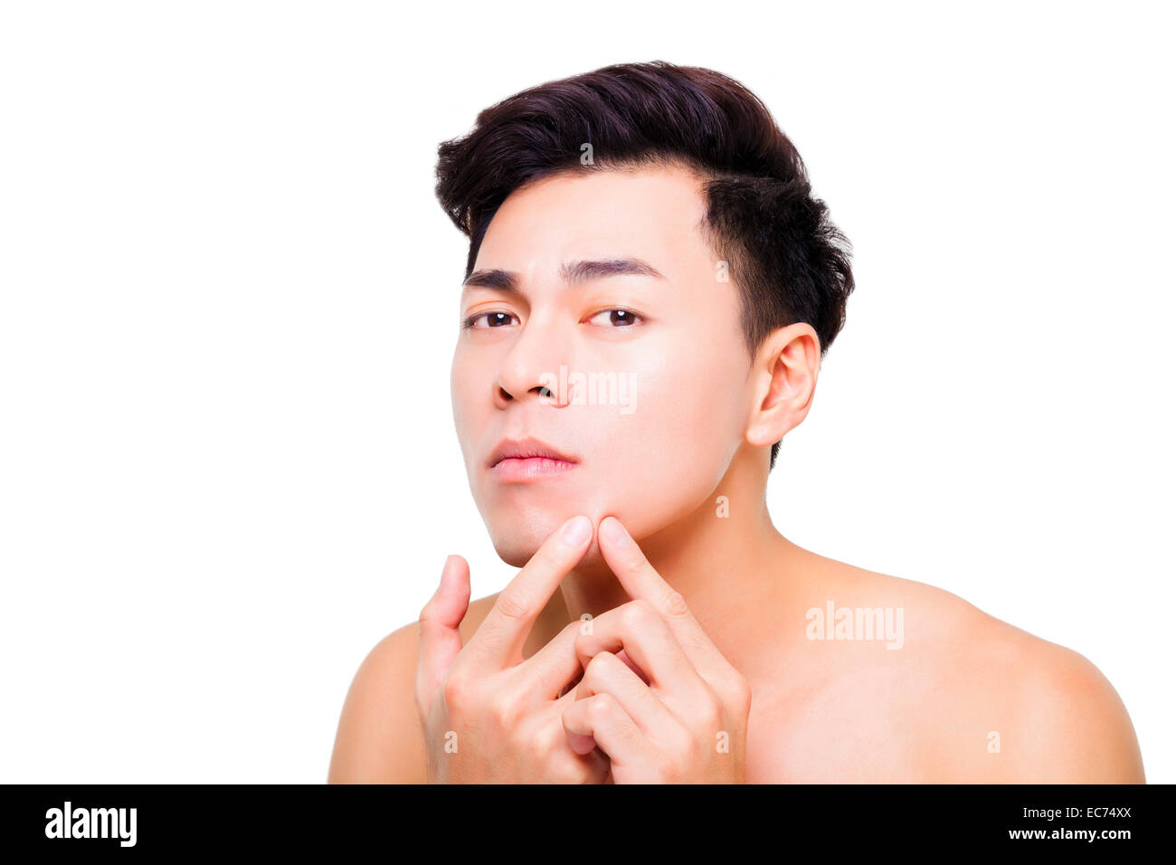 handsome young man Squeezing pimple Stock Photo - Alamy