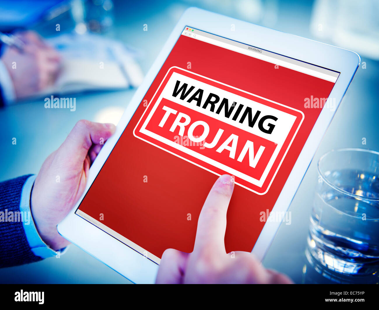 Hands Holding Digital Tablet Trojan Stock Photo - Alamy