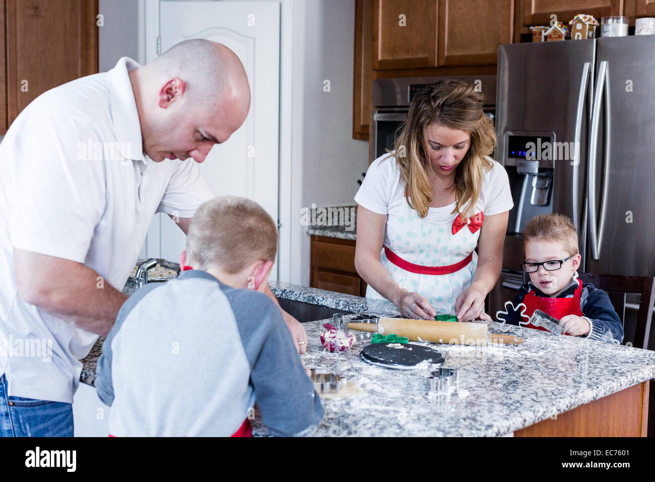 Making cookies with family for Christmas Stock Photo - Alamy