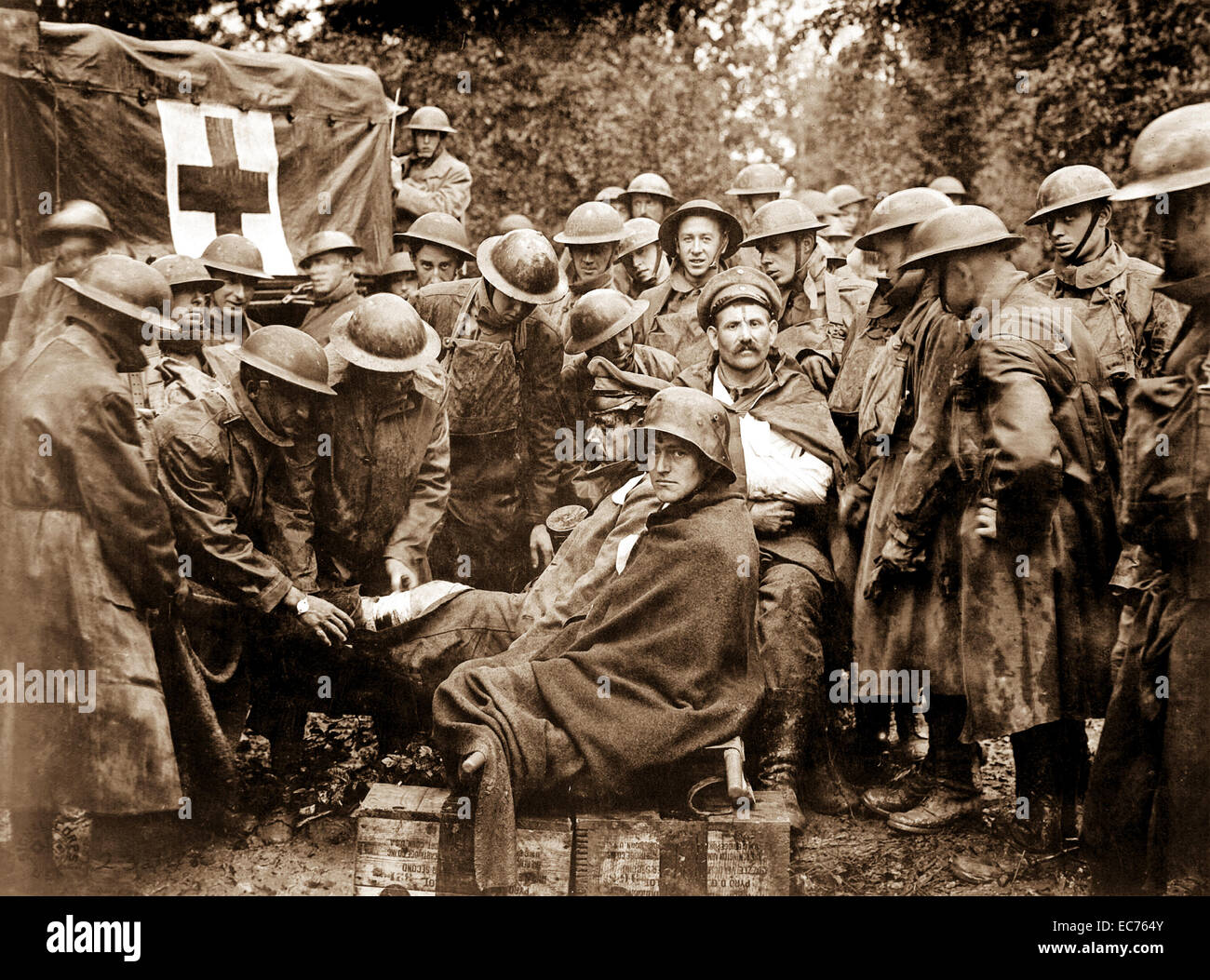 Wounded German prisoners receiving medical attention at first-aid ...