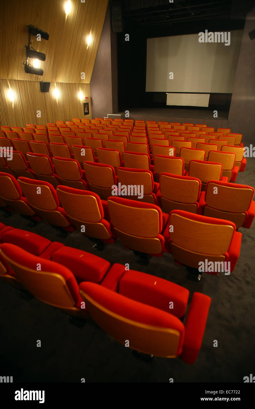 Color vertical shot of some seats in a cinema hall Stock Photo - Alamy