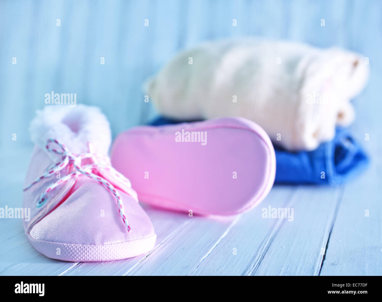 baby clothes on a table, clothes for little baby girl Stock Photo - Alamy