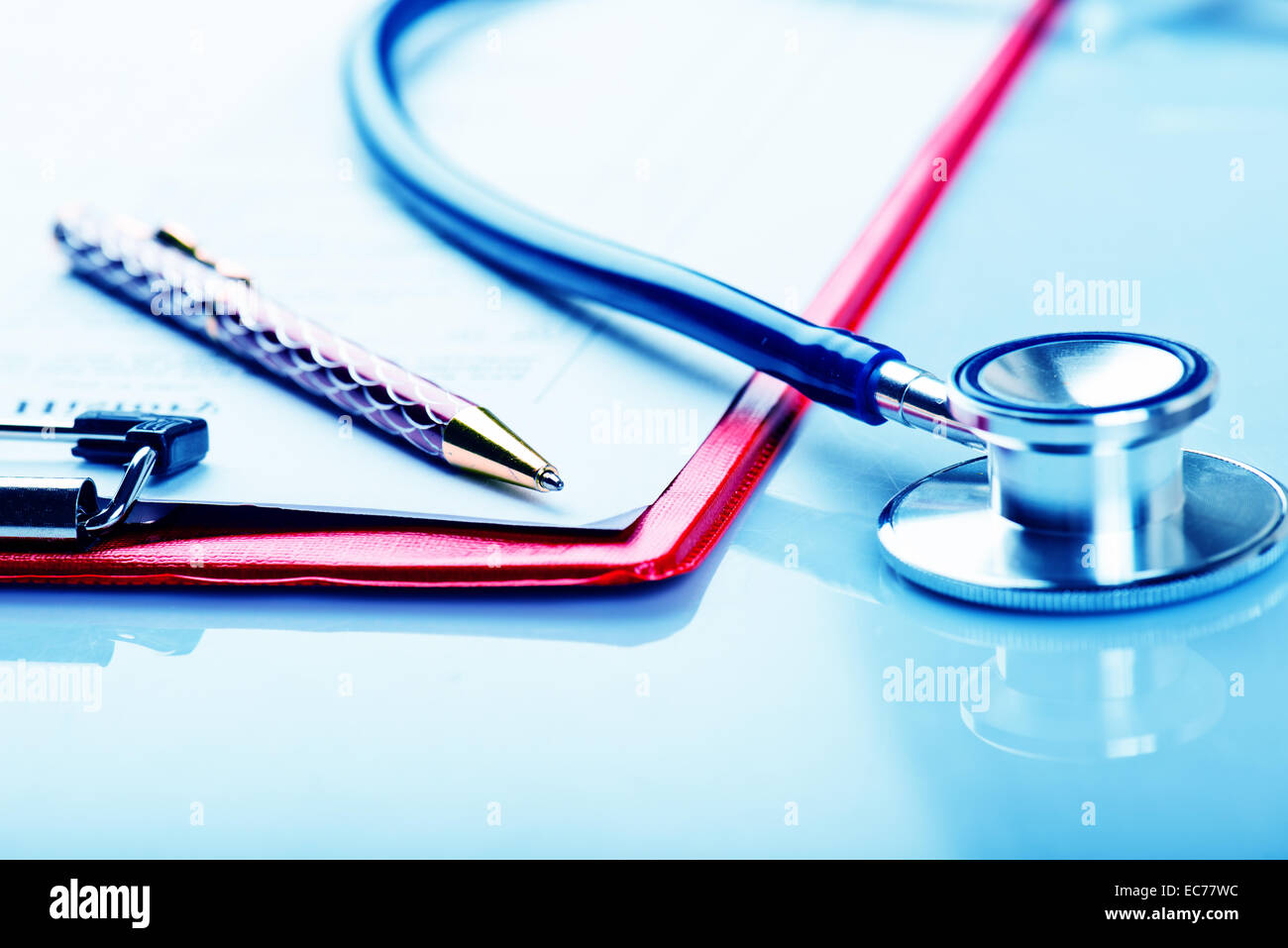 medical history with stethoscope and pen Stock Photo - Alamy