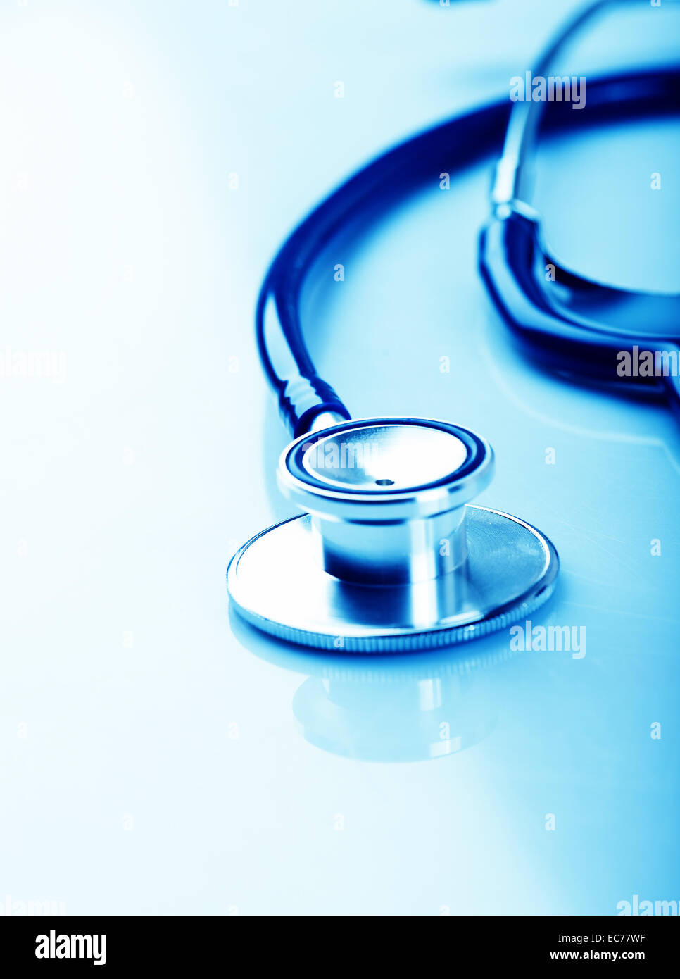 Stethoscope on blue background Stock Photo - Alamy