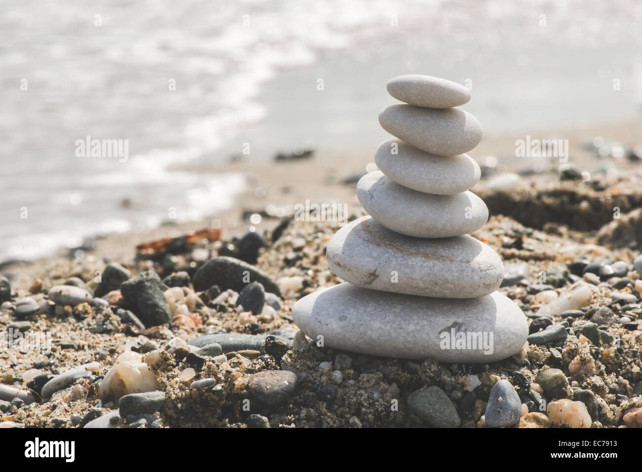 Stacked white sea stones Stock Photo - Alamy