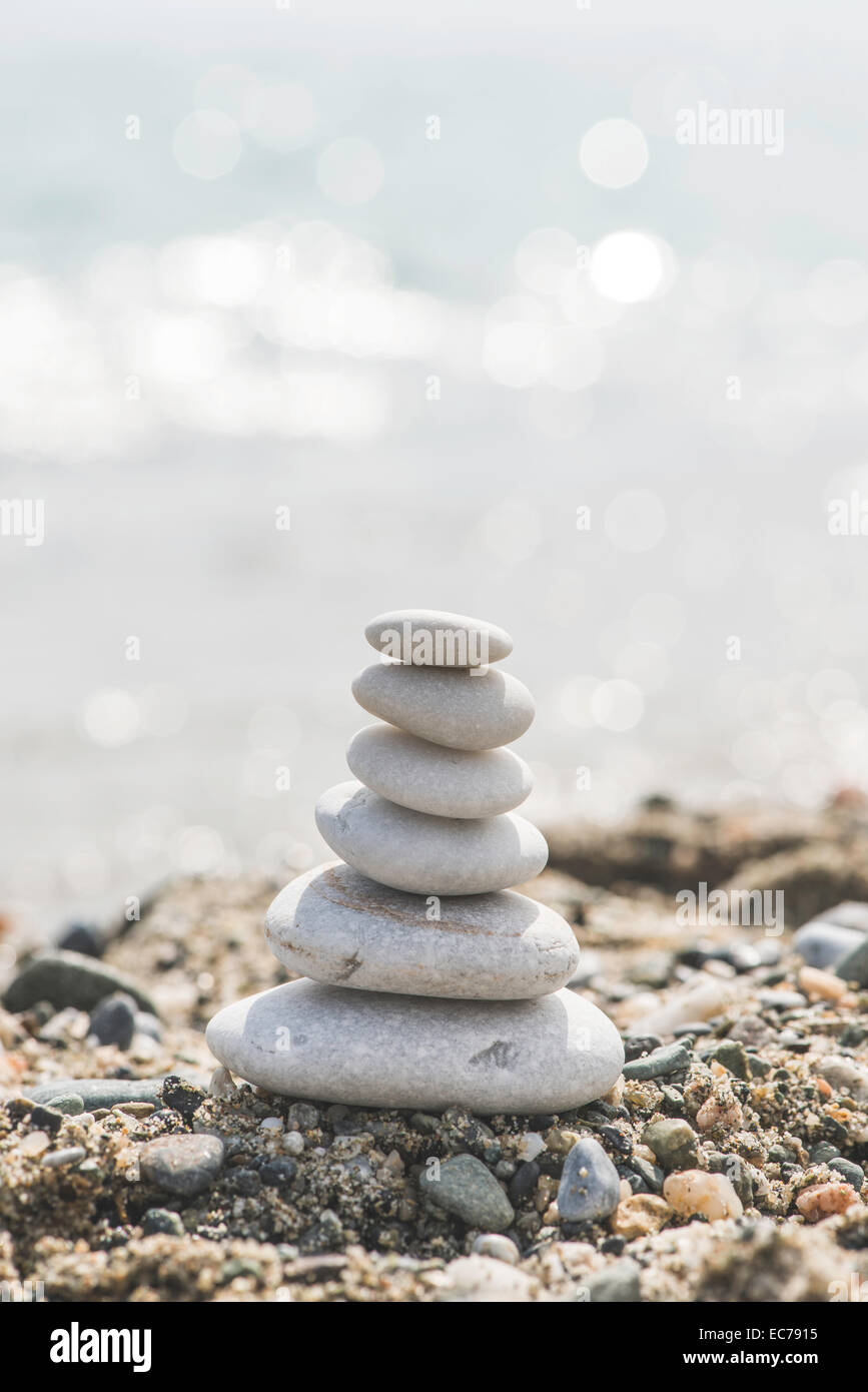 Stacked white sea stones Stock Photo - Alamy