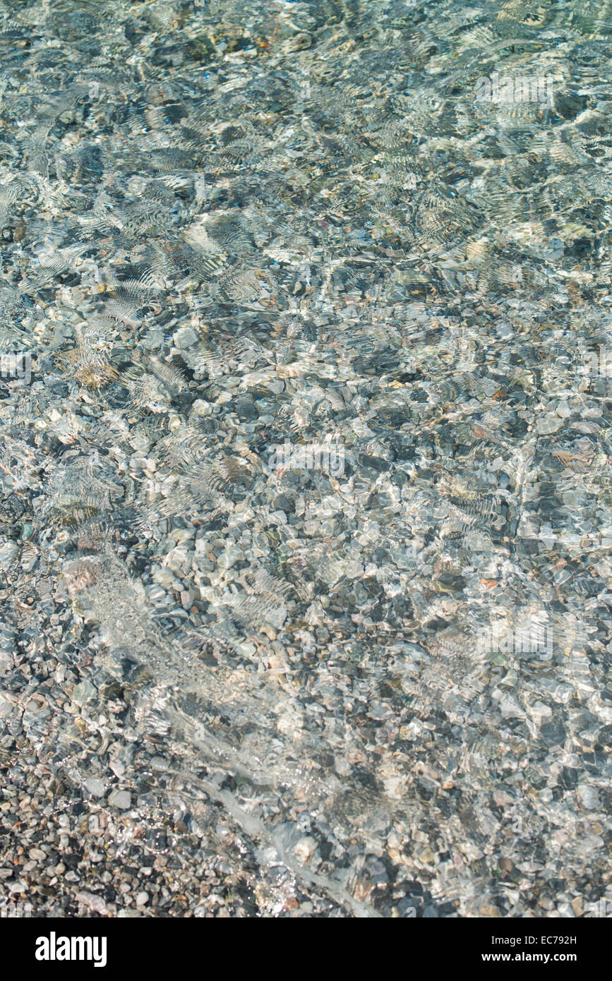 Pebbles beach. Sea waves Stock Photo - Alamy