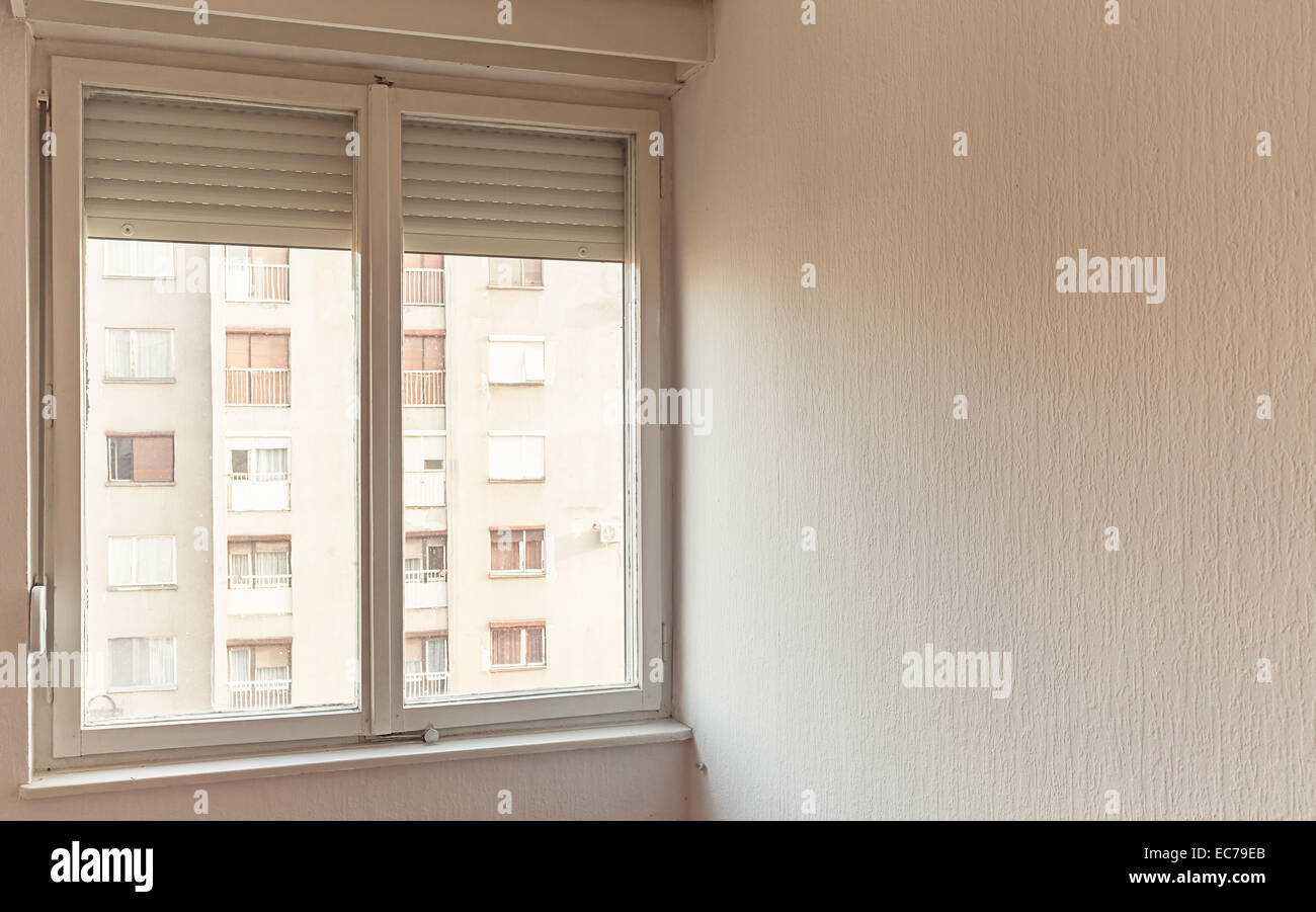 Inside room, view through window showing building Stock Photo - Alamy