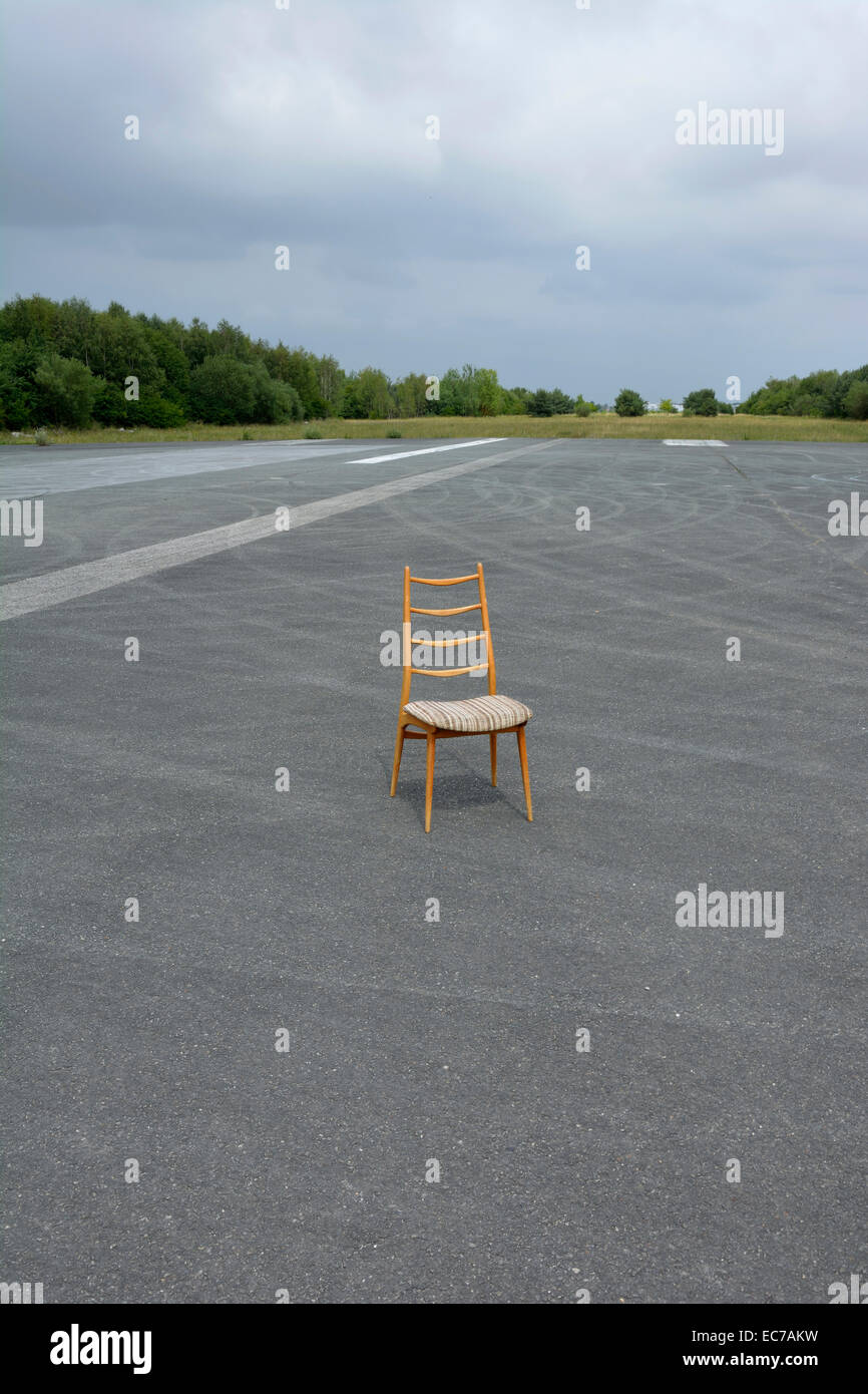 Wood chair on a runway Stock Photo - Alamy