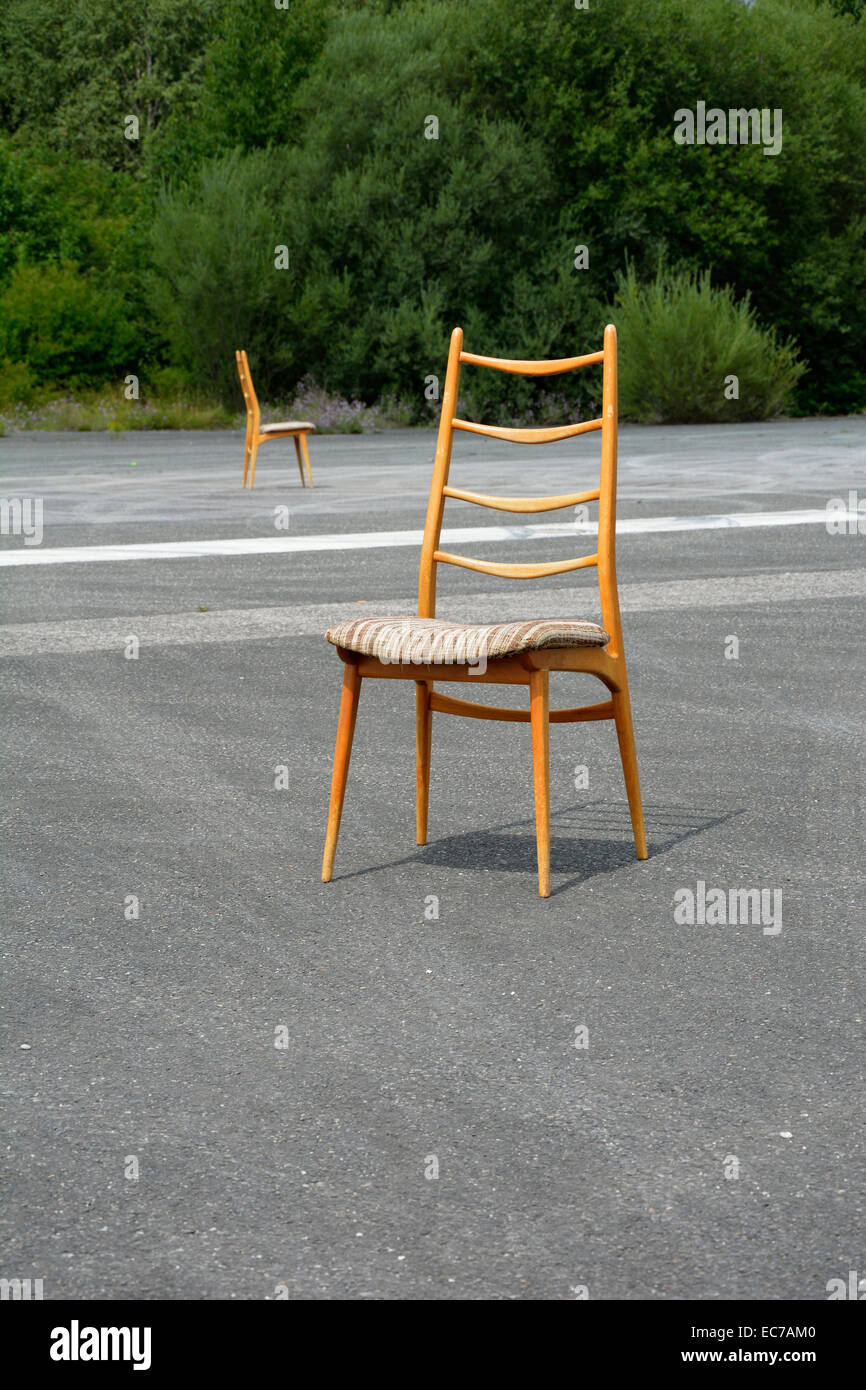 Two wood chairs on a runway Stock Photo - Alamy