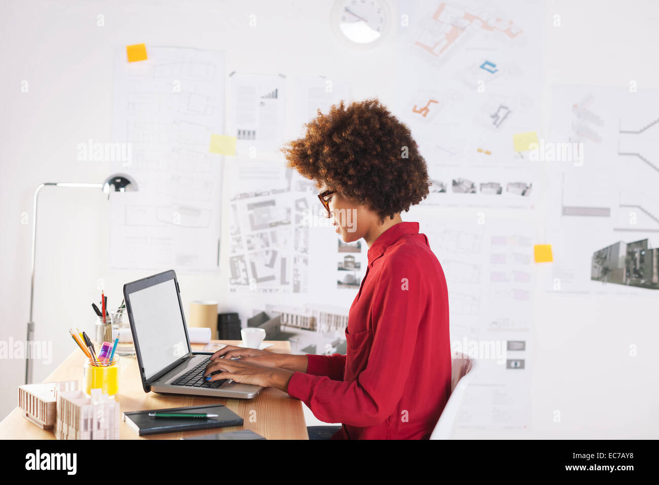 African american woman architect using hi-res stock photography and ...
