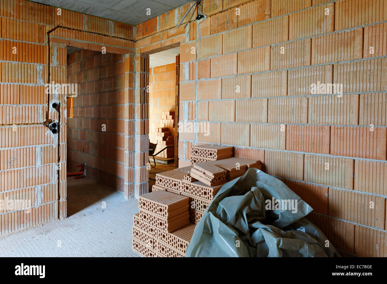 Stacks of bricks at construcion site of a residential house Stock Photo ...