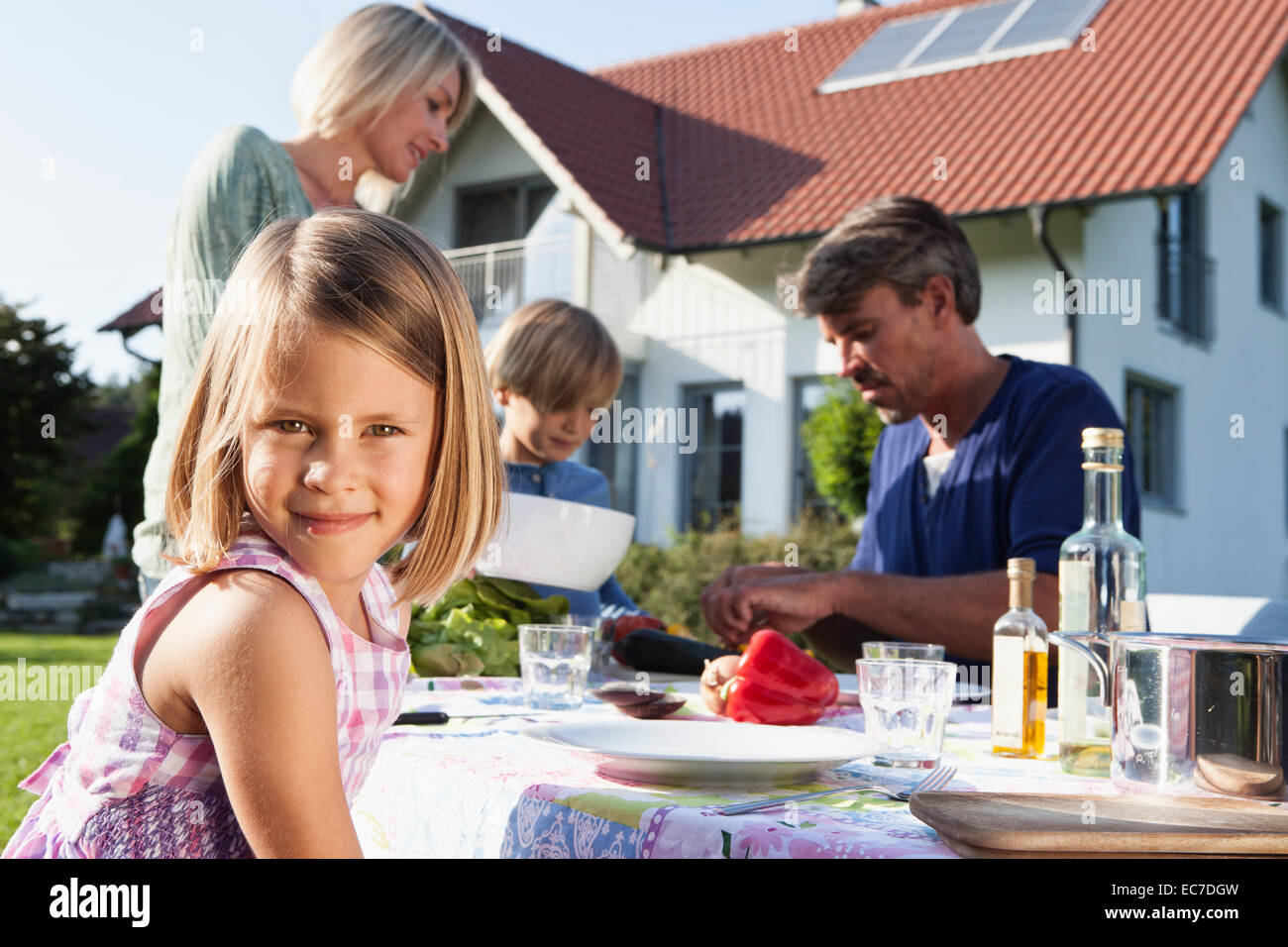 Family having lunch in garden Stock Photo - Alamy
