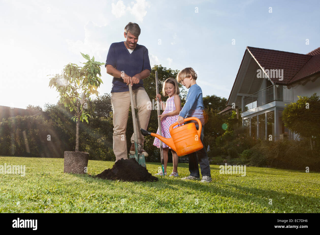 Children planting tree hi-res stock photography and images - Alamy