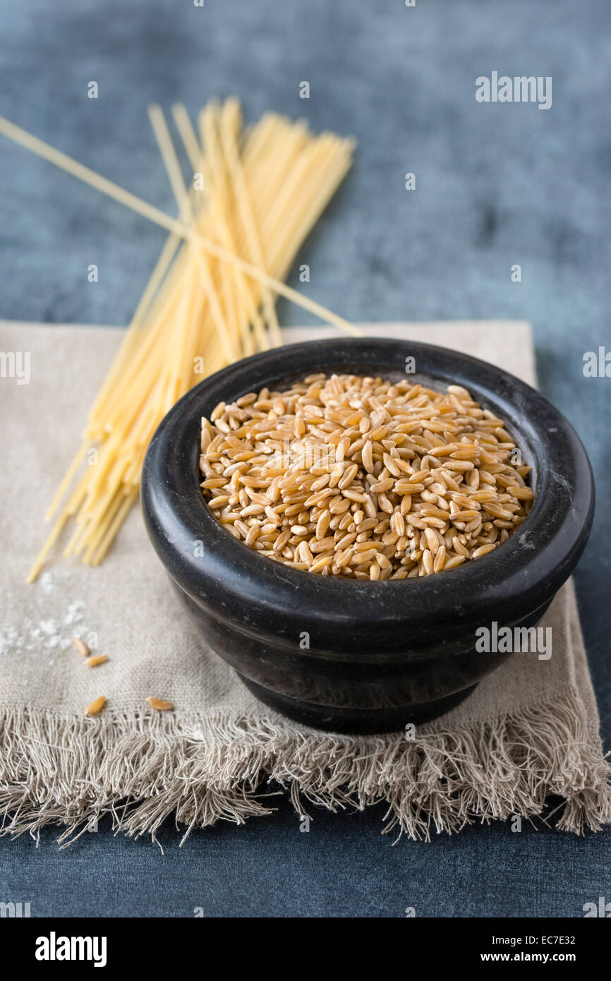 Bowl of polish wheat and spaghetti made of polish wheat on cloth Stock ...