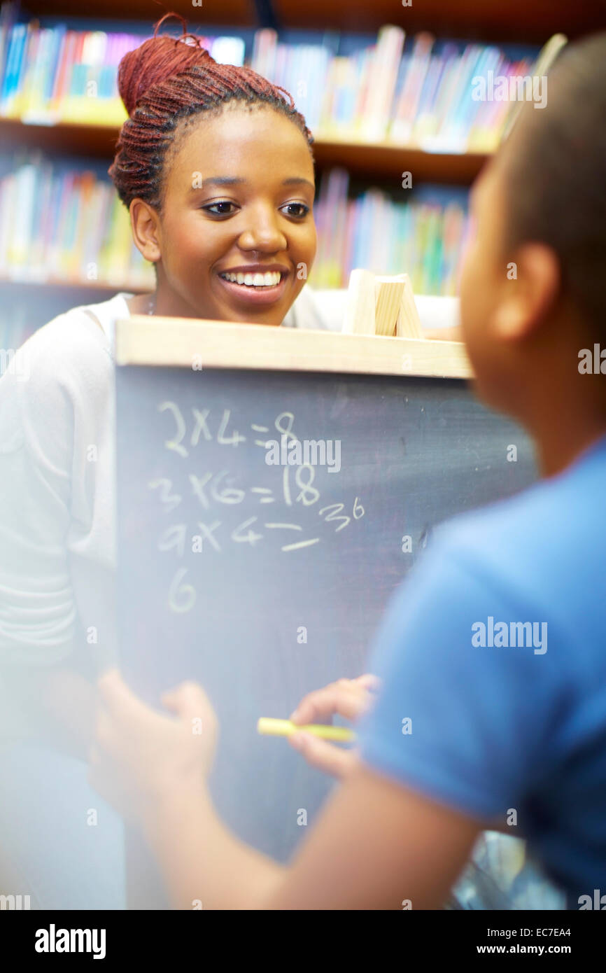 Boy doing maths hi-res stock photography and images - Alamy