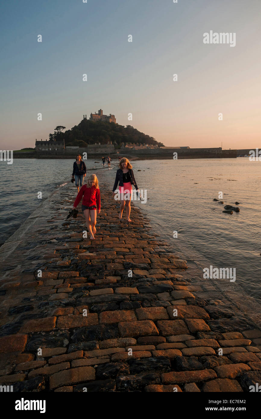 UK, England, Cornwall, family on causeway at tidal island St Michael's ...