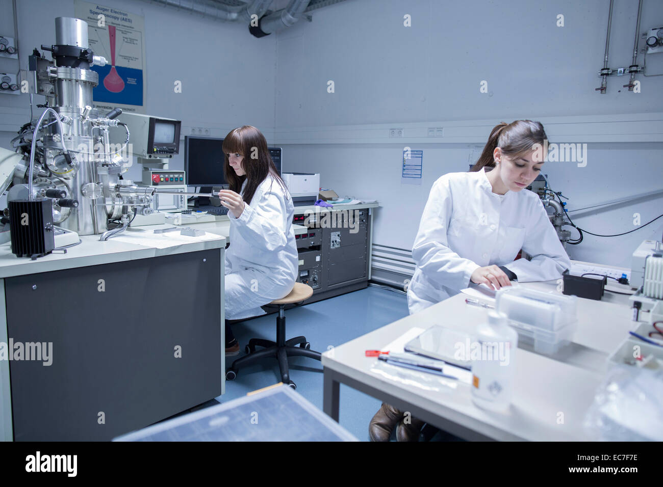Two female technicans working in a technical laboratory Stock Photo - Alamy