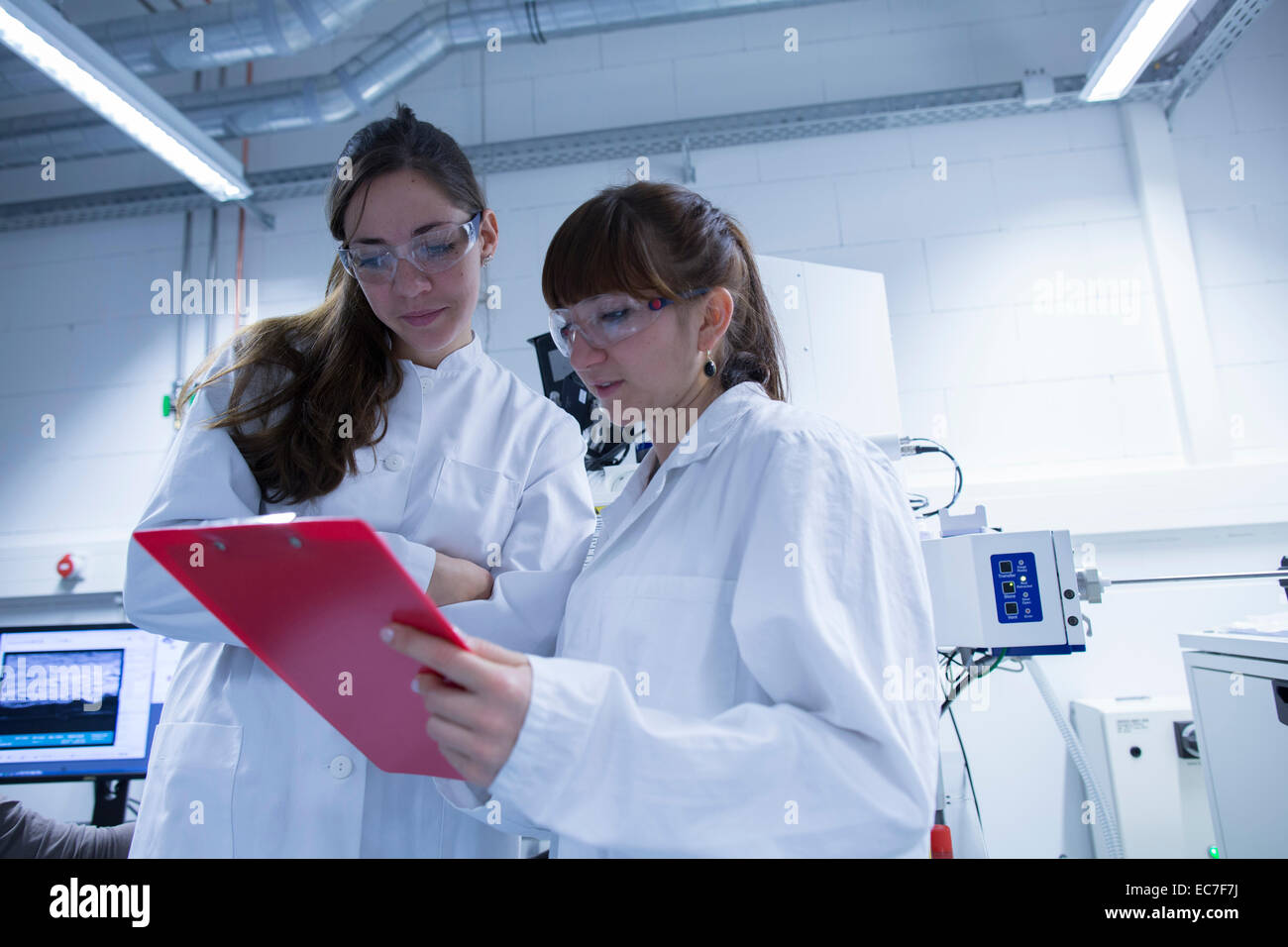 Two female technicans working together in a technical laboratory Stock ...