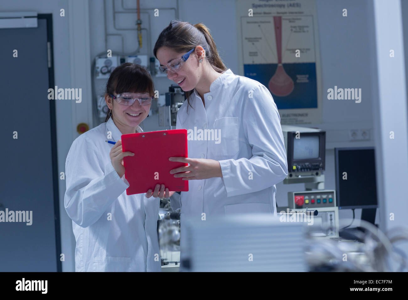Two female technicans working together in a technical laboratory Stock ...