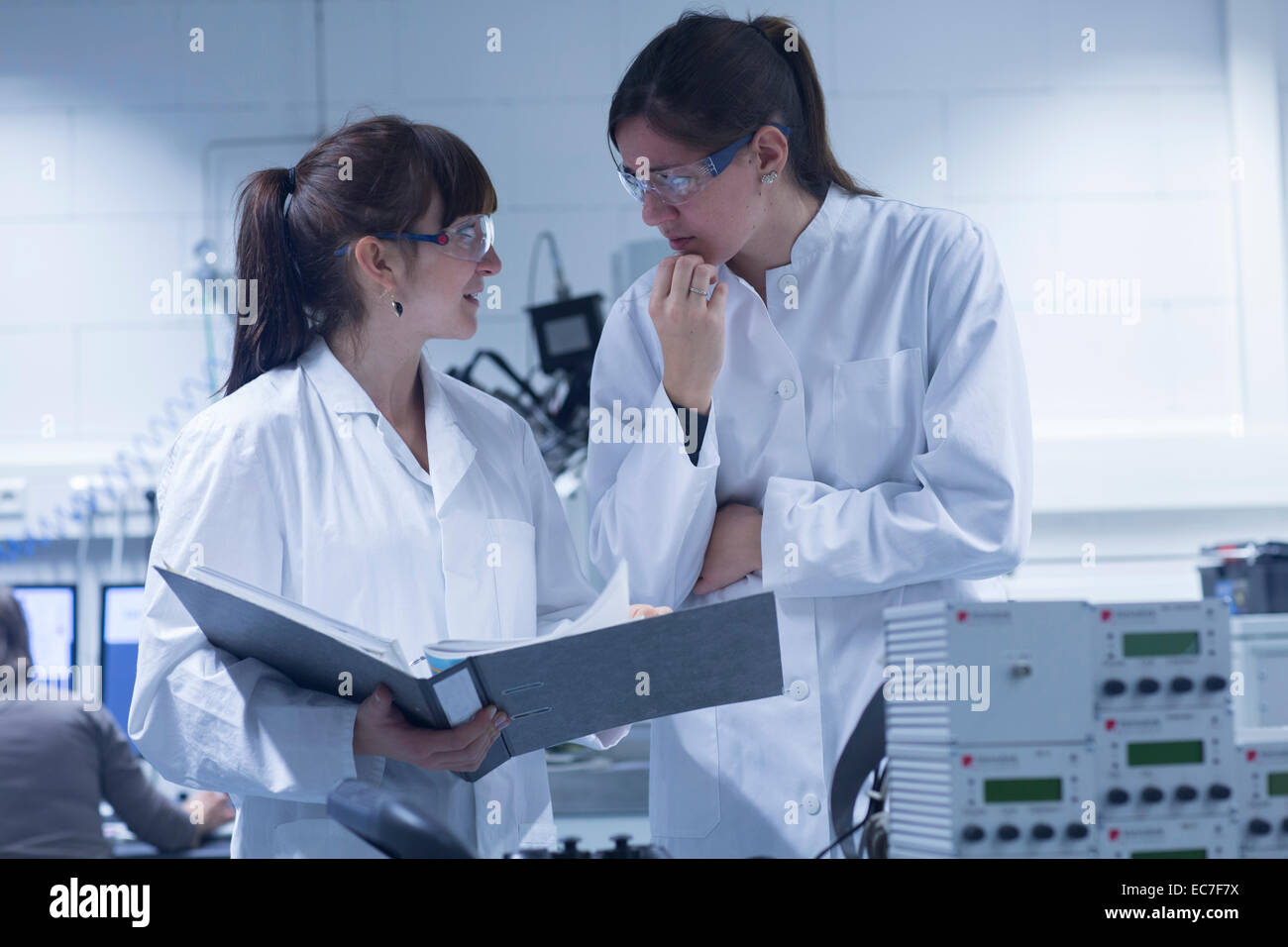 Two female technicans working together in a technical laboratory Stock ...