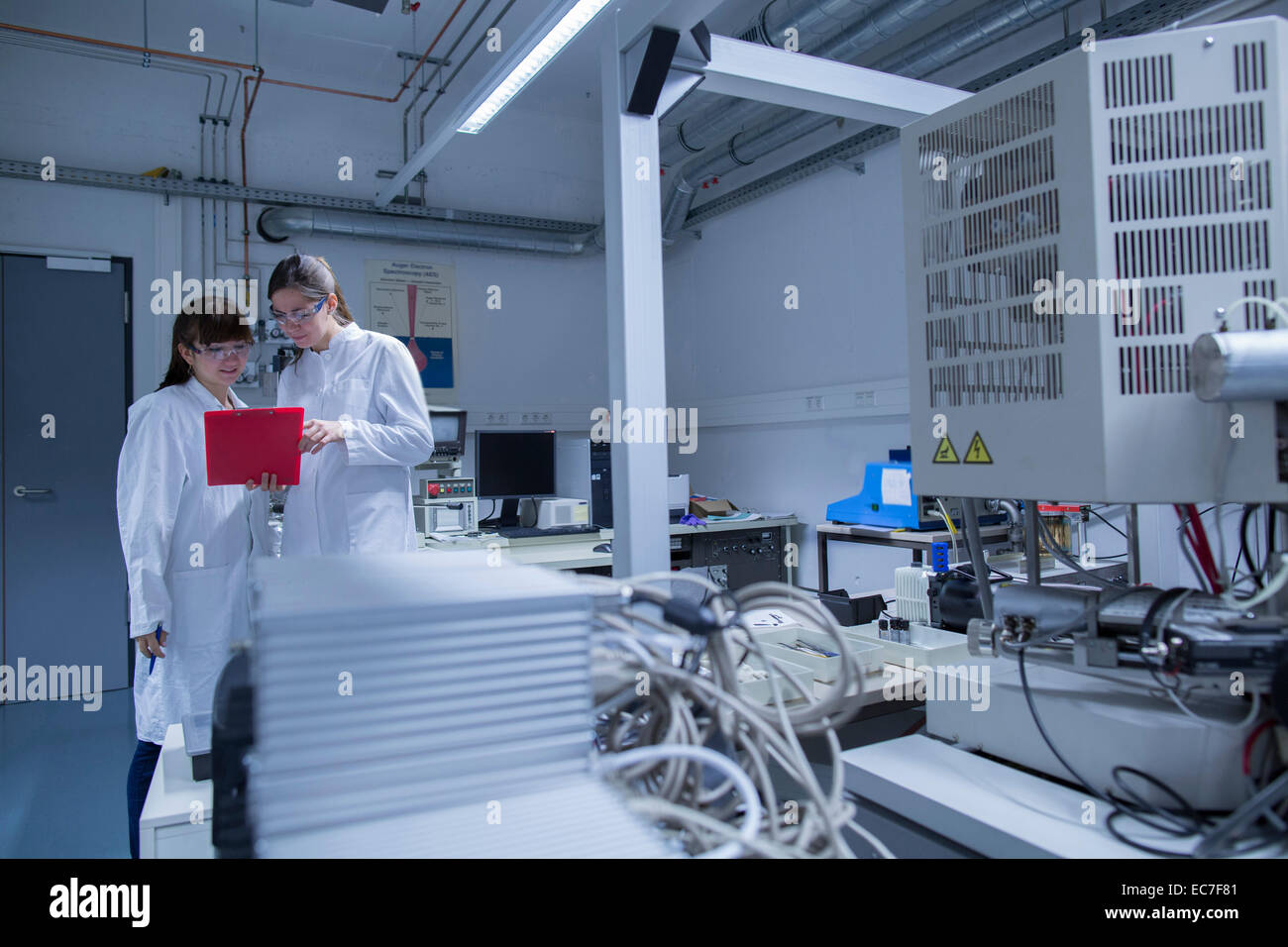 Two female technicans working together in a technical laboratory Stock ...
