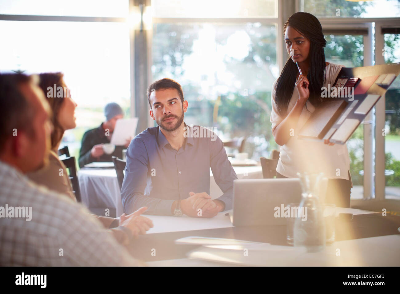 Business meeting in a restaurant Stock Photo - Alamy
