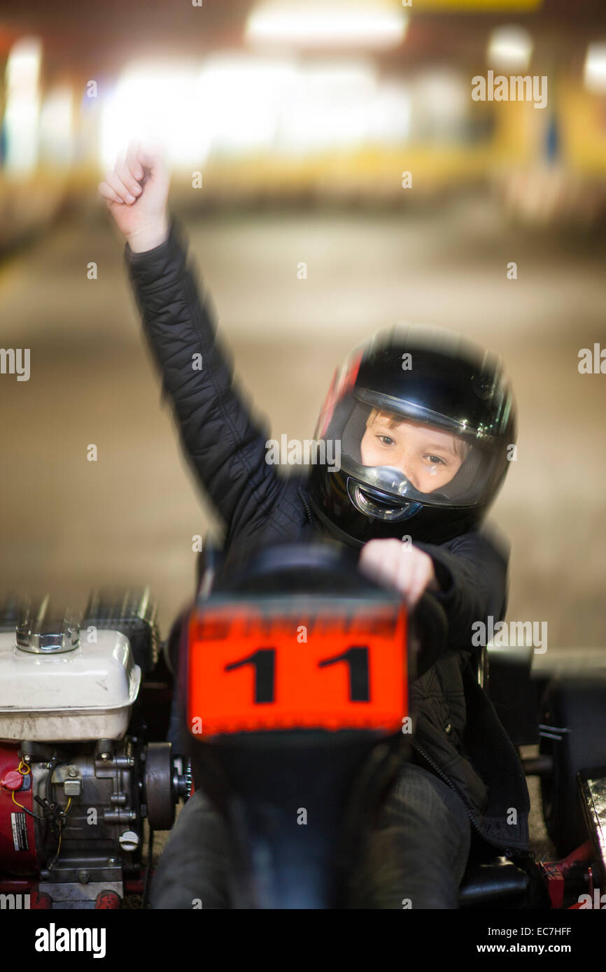 Boy driving kart Stock Photo - Alamy
