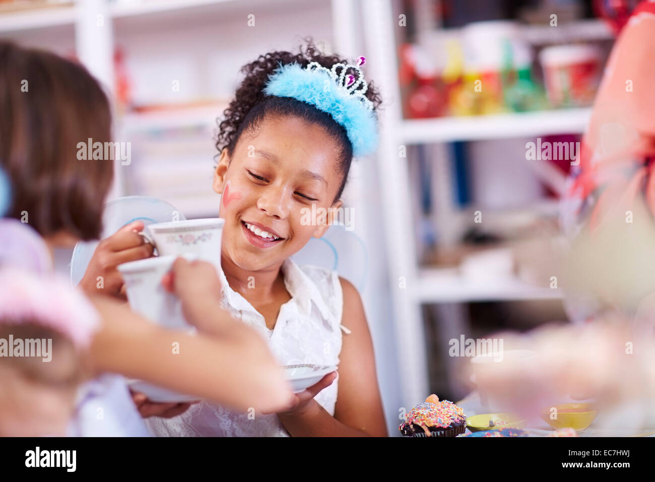 Two girls on a tea party Stock Photo - Alamy