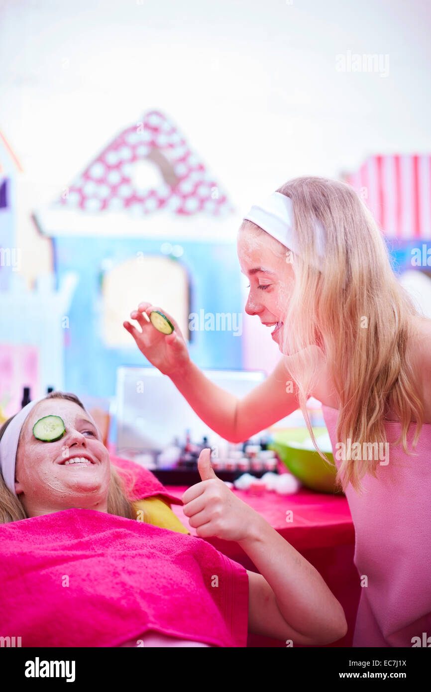 Two girls on a beauty farm pampering themselves Stock Photo - Alamy