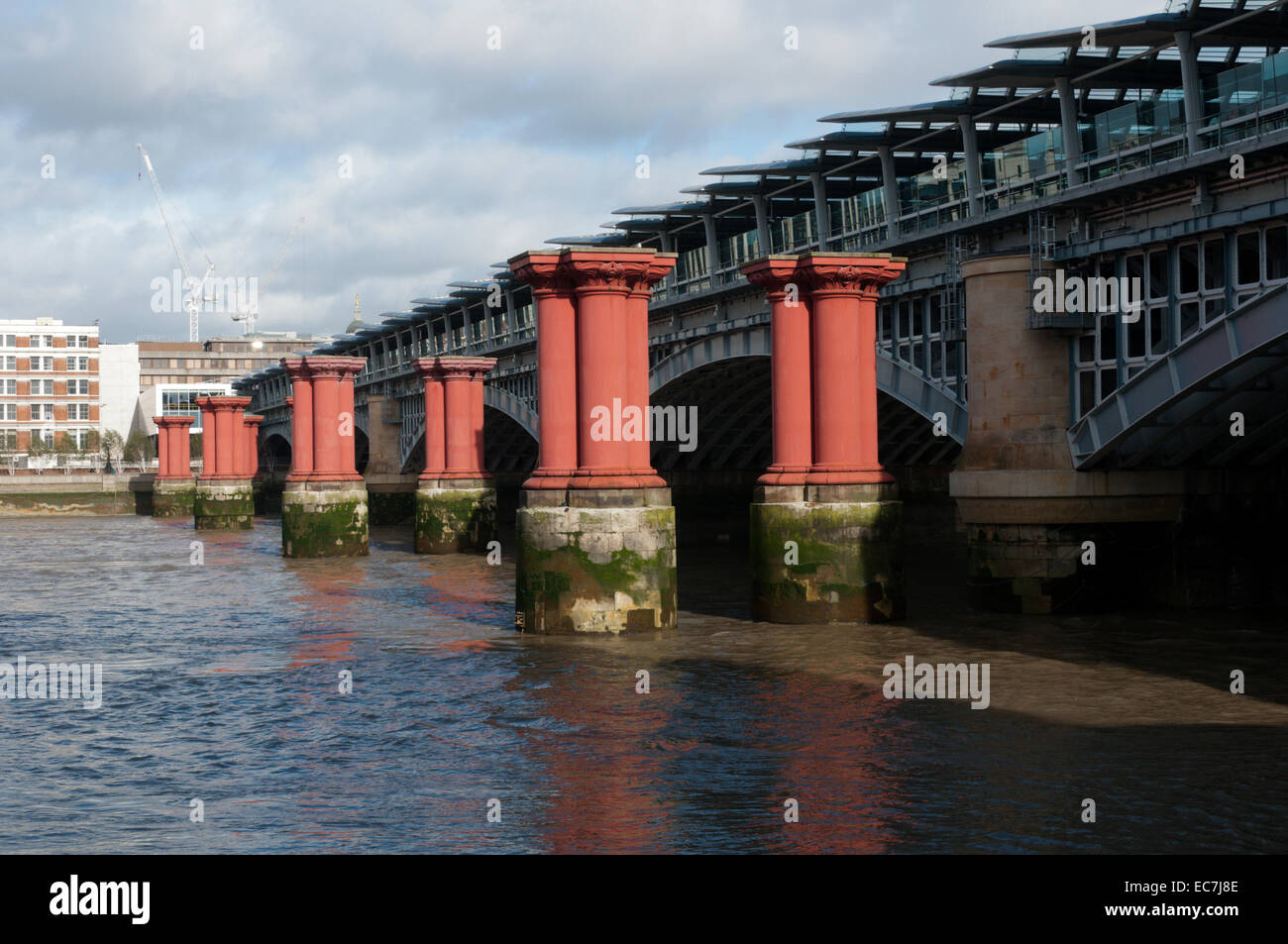 Pillars of the old Blackfriars Bridge across the River Thames, next to ...