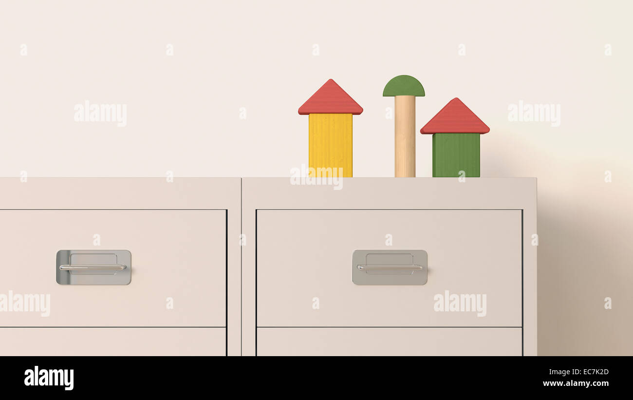 Building blocks arranged on cabinet Stock Photo - Alamy