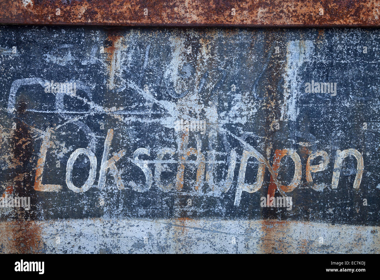Rusty steel plate with inscription Stock Photo - Alamy