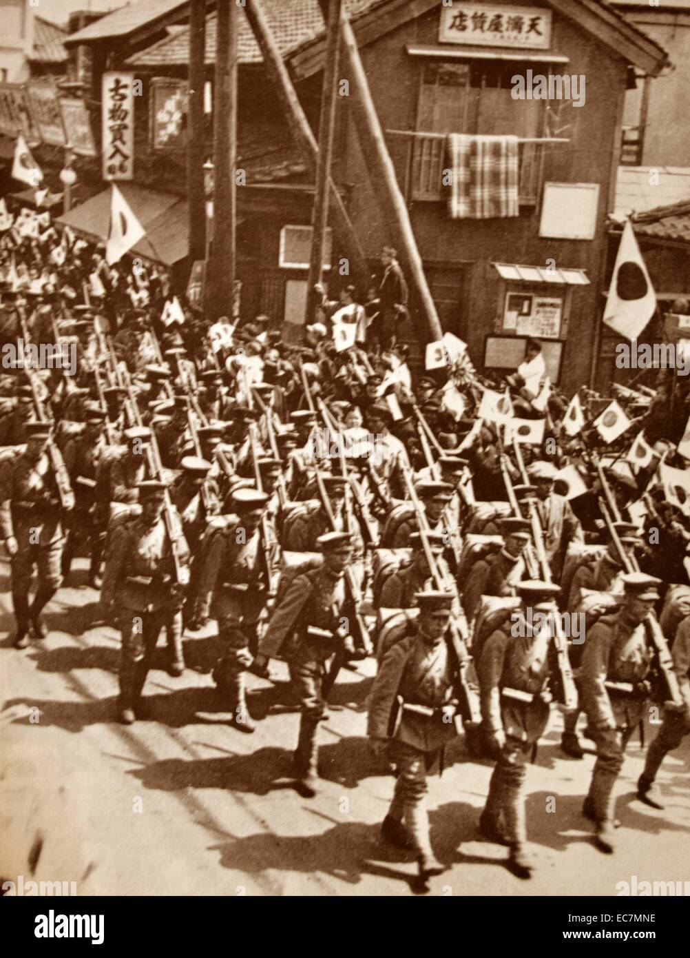 Celebratory parade by Japanese soldiers before embarkation to Manchuria ...