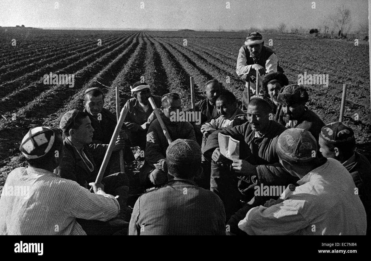 Uzbek collective farmers discussing work of spring sowing in the USSR ...