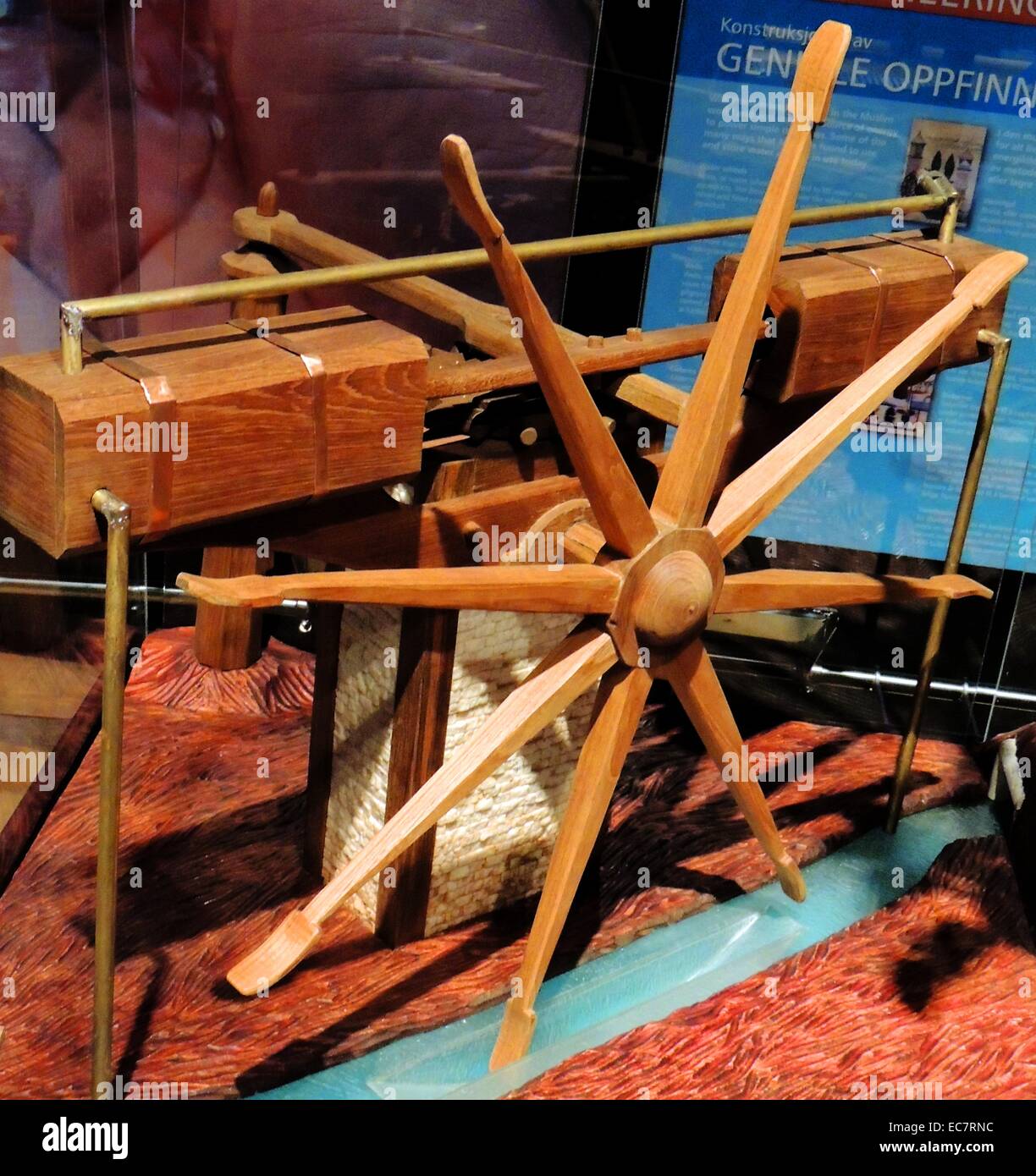 Four scoop machine. The animal turns a horizontal gear which rotates a ...