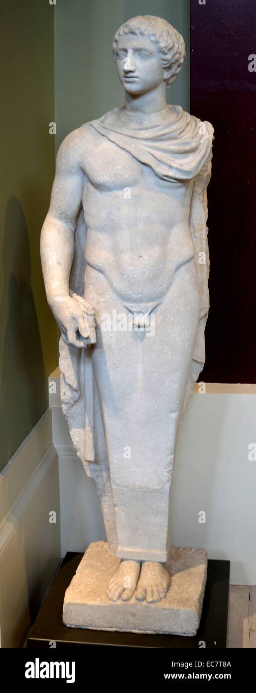 Marble herm. Head, feet, right arm and lower part of shaft restored ...