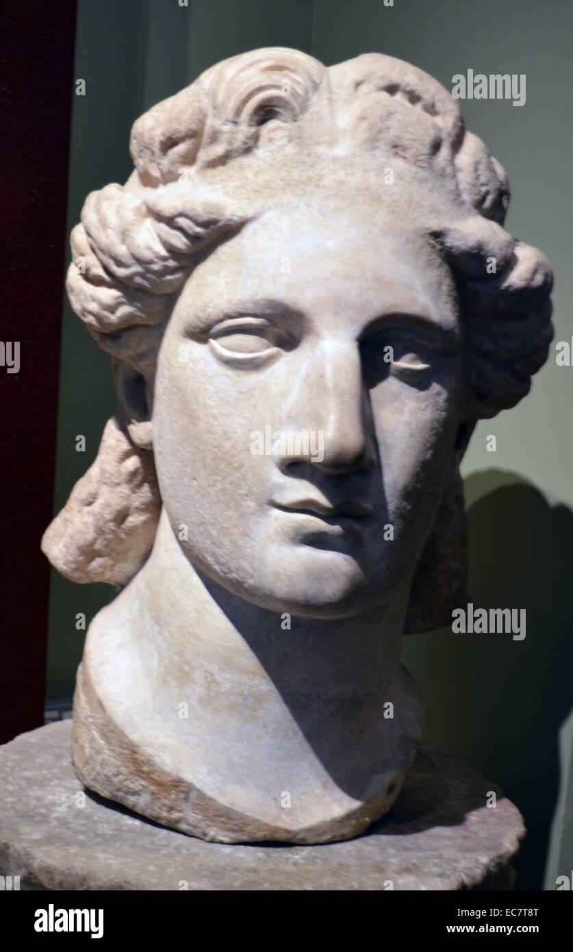 Colossal marble head of Apollo. The nose, chin, mouth, forehead and ...