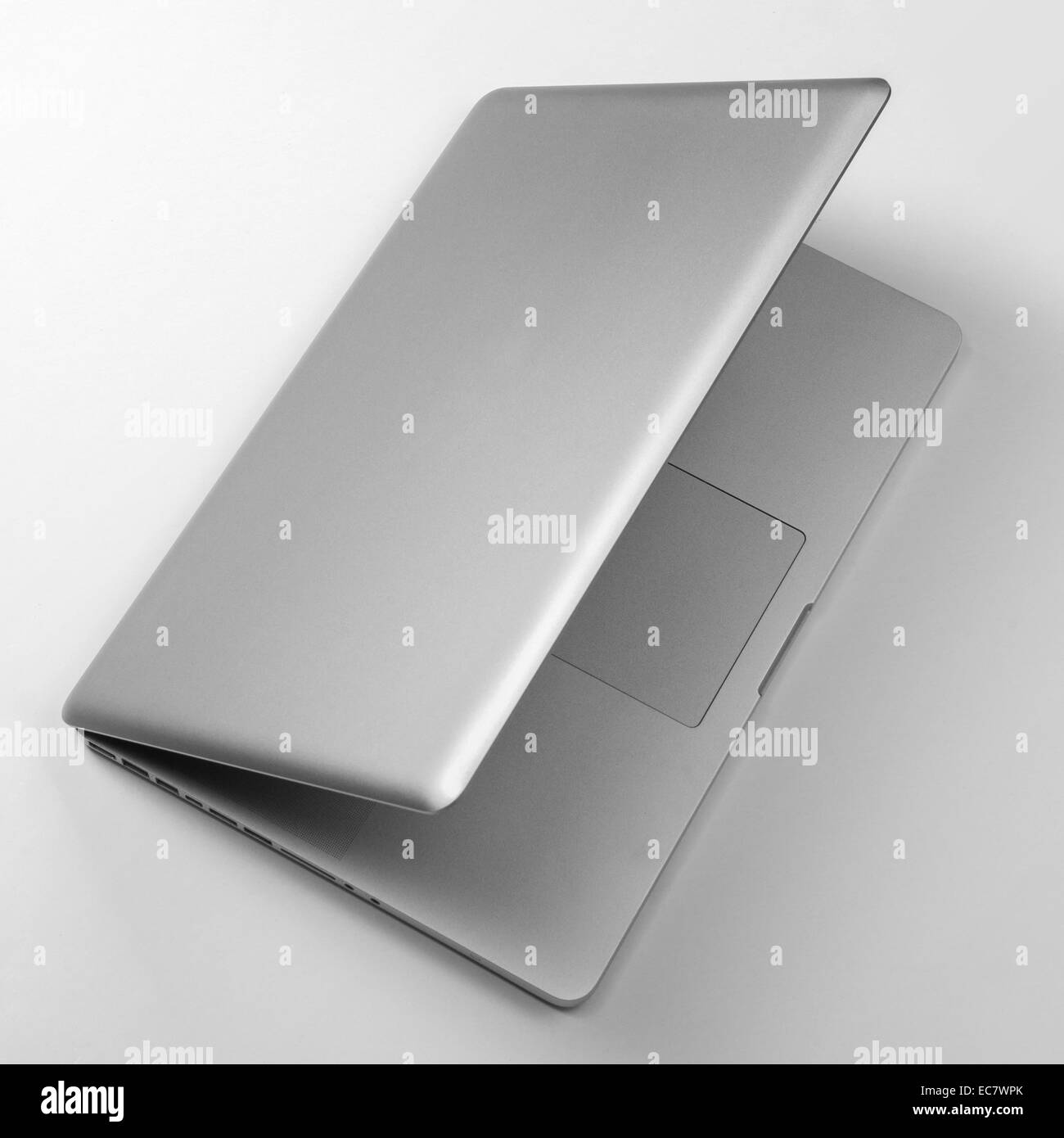 Top view of laptop on white table Stock Photo - Alamy