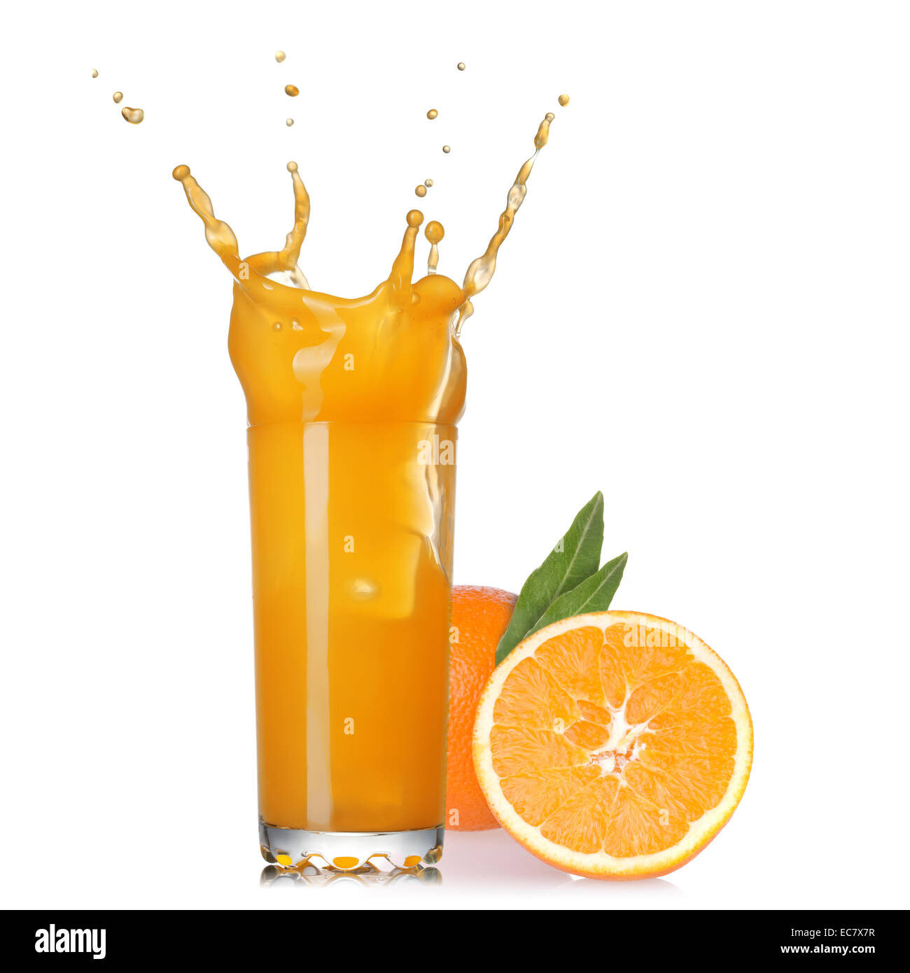 splash of juice in the glass with orange isolated on white Stock Photo ...