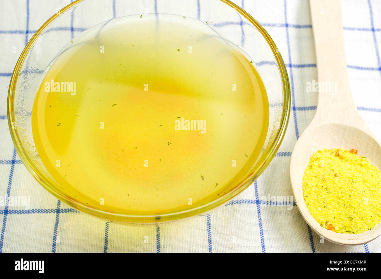 Broth, bouillon, clear soup? stock in a transparent bowl. Near bouillon ...