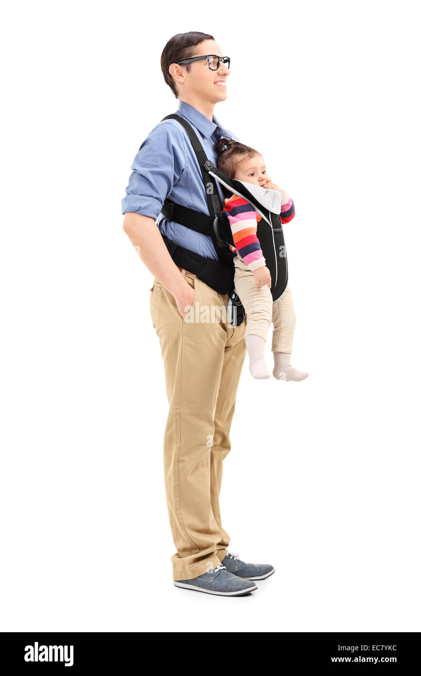 Full length portrait of a young father carrying his baby daughter ...