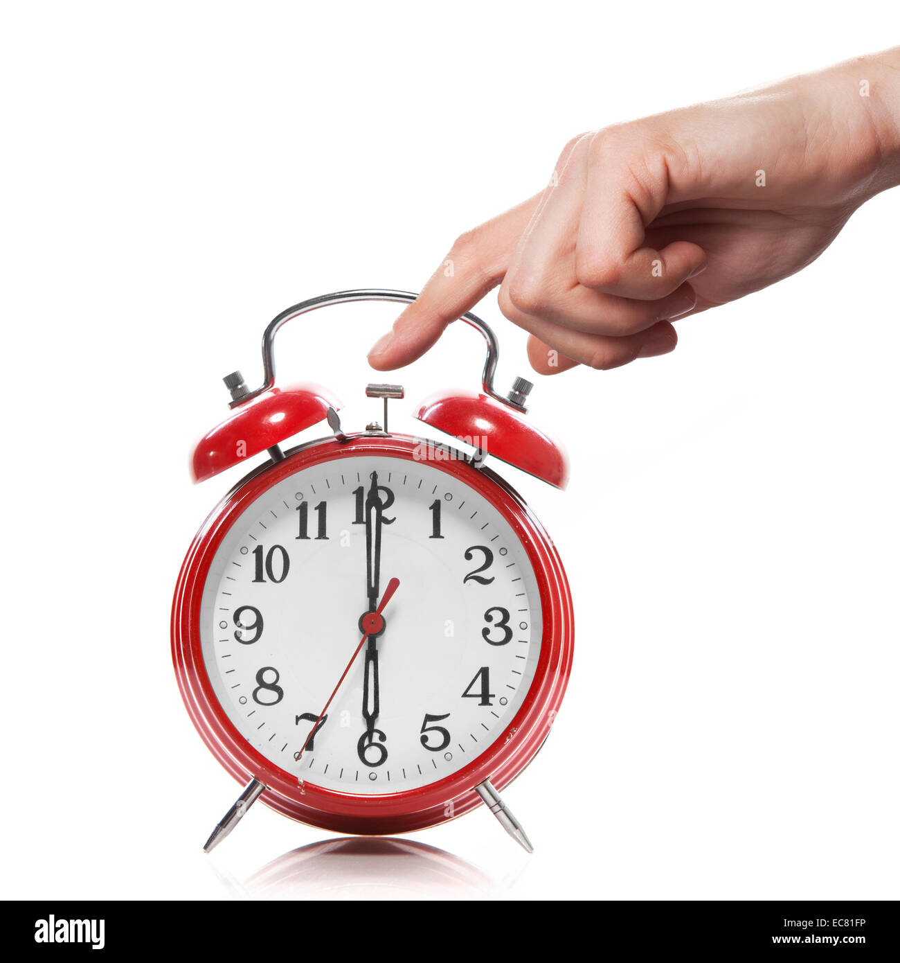hand and red old style alarm clock isolated on white Stock Photo - Alamy