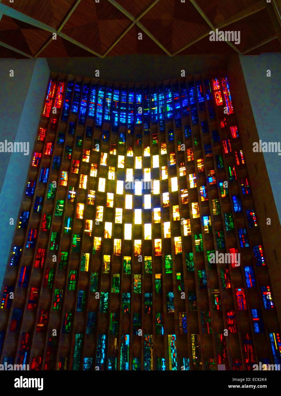 stained glass windows designed by john Piper depict the light of god ...