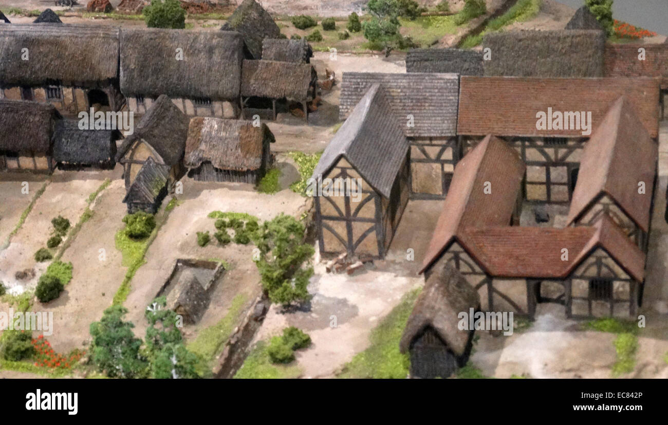 Model of homes in Birmingham 1300. The home on the right is far grander ...