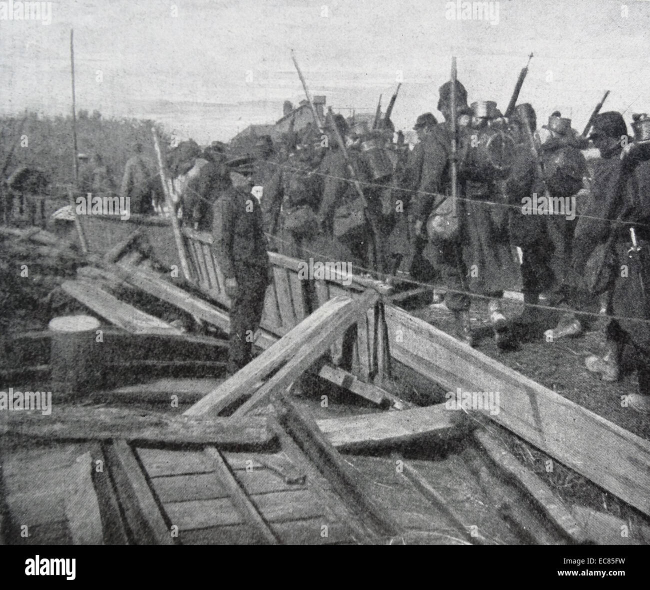 Photograph of French Soldiers crossing a bridge on their way between ...